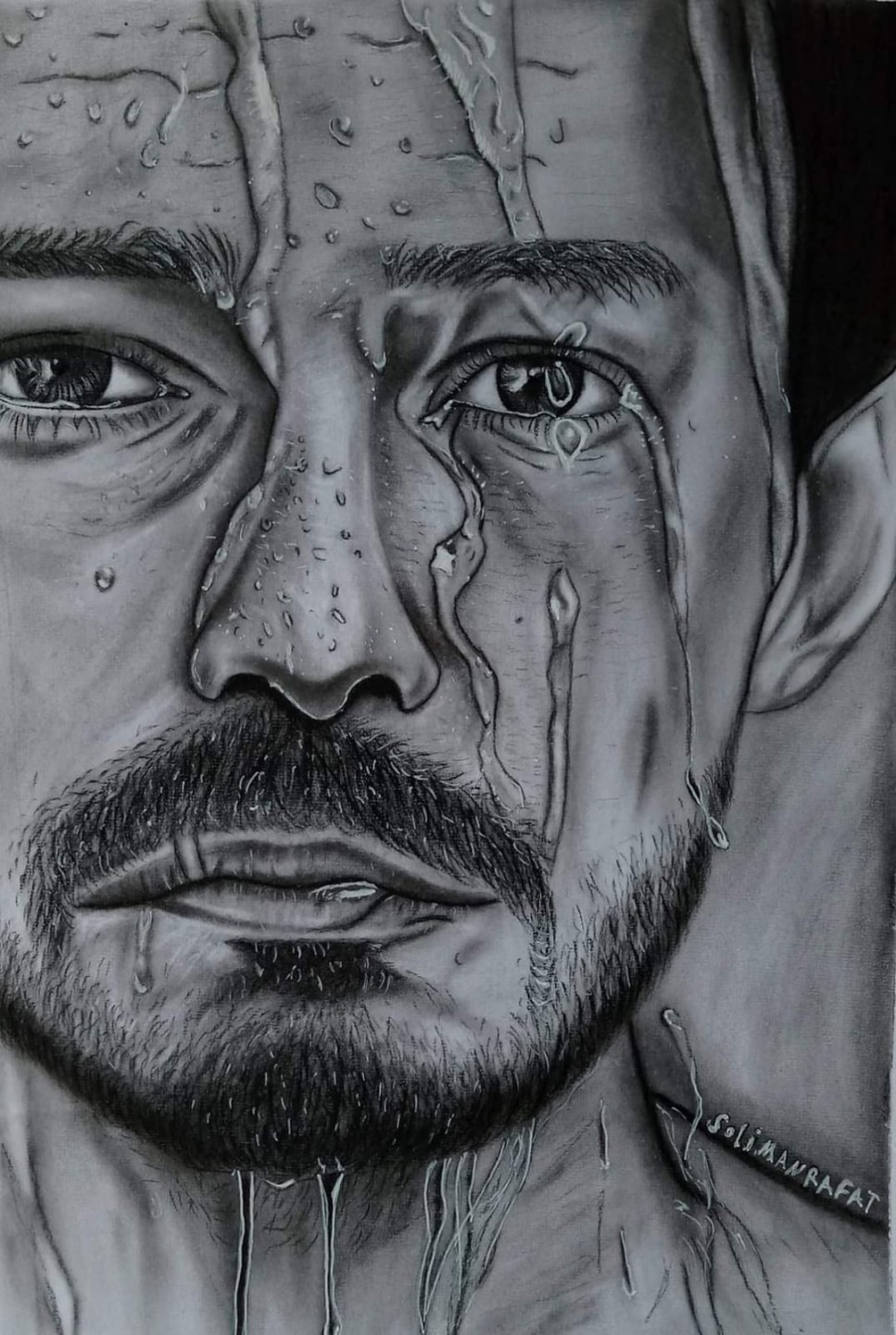 بالفحم والشاي.. سليمان يبدع في رسم لوحات خلابة | المنوعات | الطريق